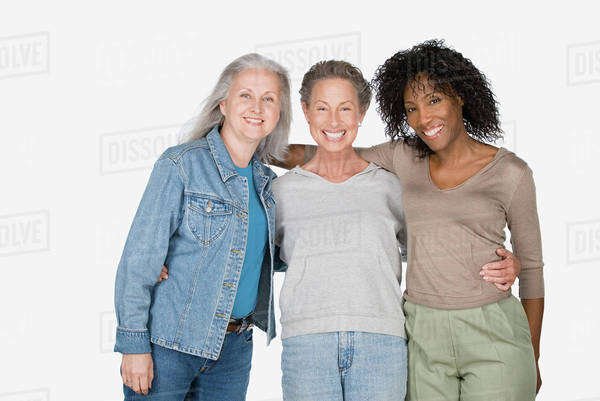 Studio portrait of three mature women - Stock Photo - Dissolve