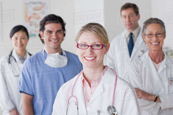 Group portrait of smiling doctors - Royalty-free Stock Photo | Dissolve