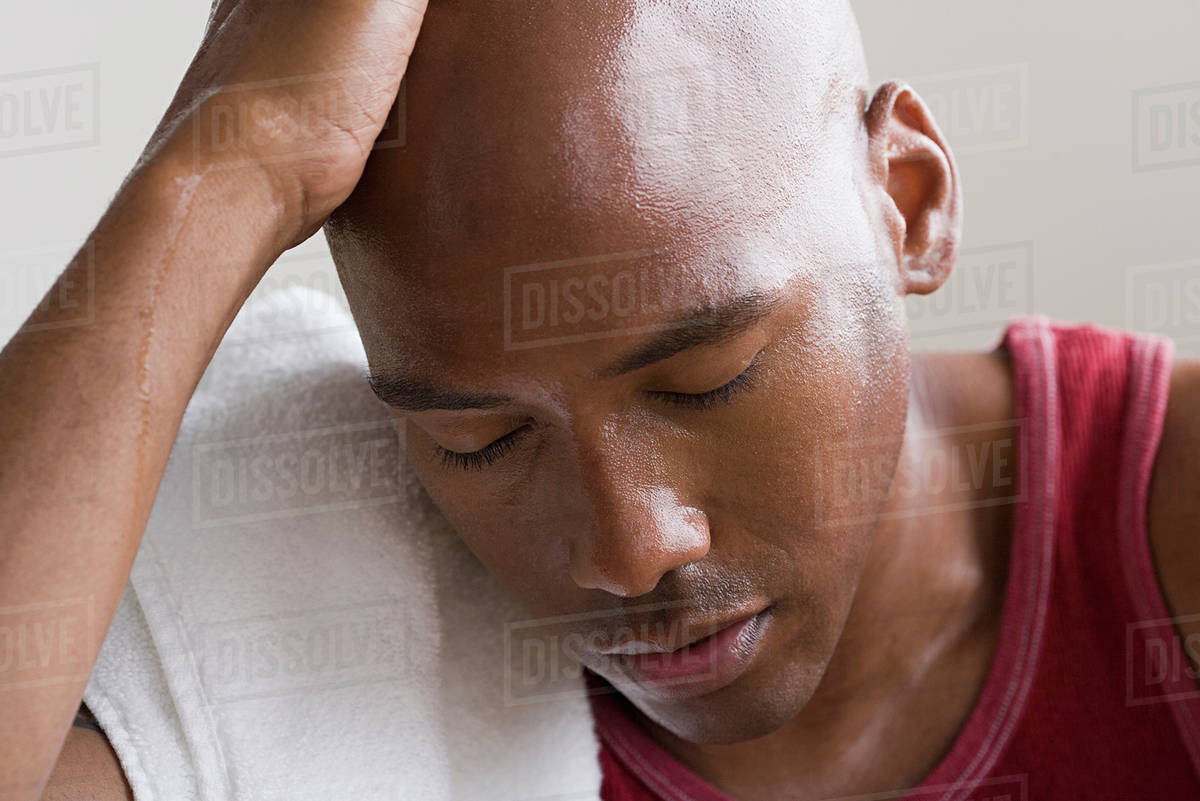 Portrait of sweating athlete - Royalty-free Stock Photo | Dissolve