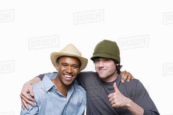 Studio portrait of two young men - Royalty-free Stock Photo | Dissolve