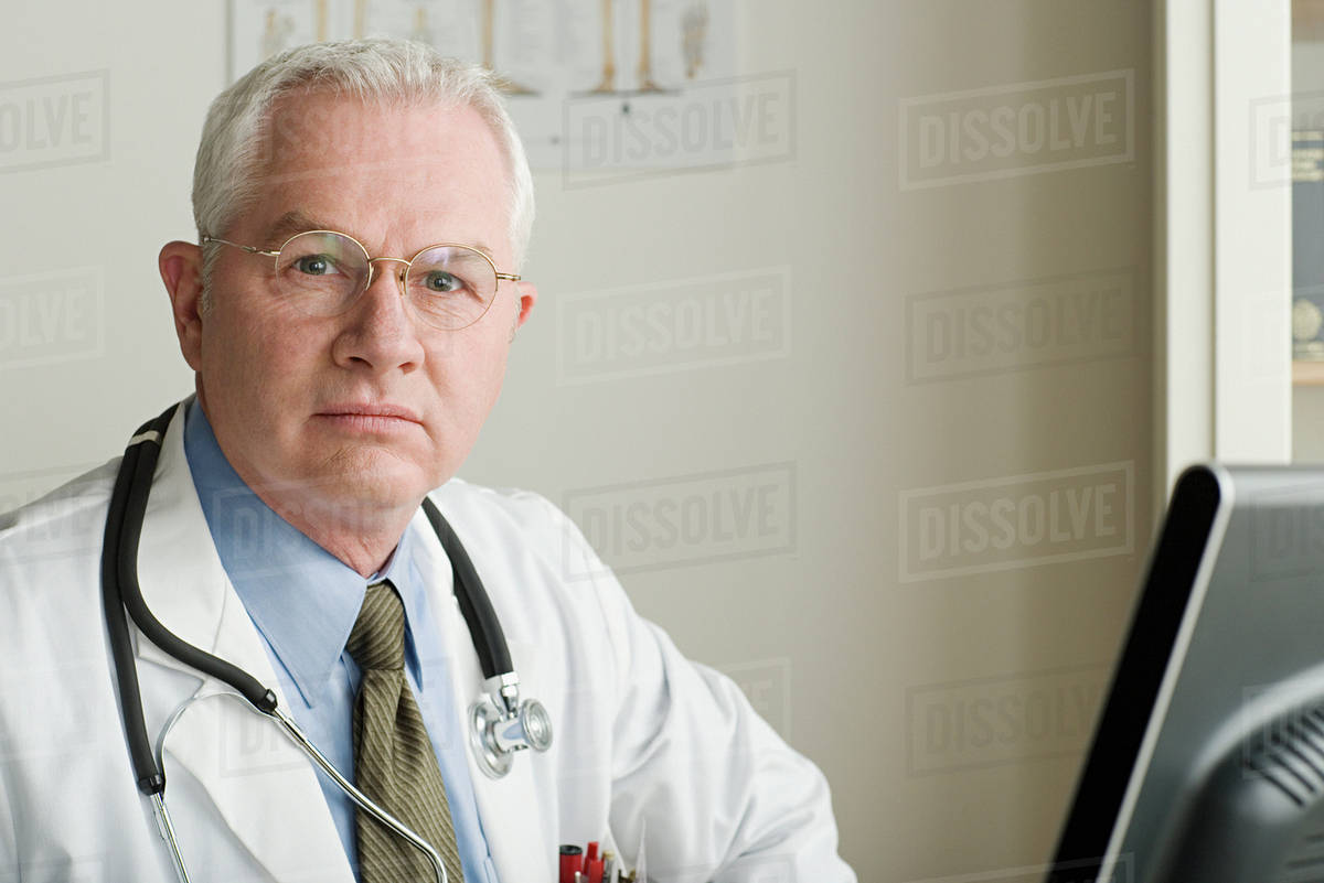 Portrait of male doctor - Royalty-free Stock Photo | Dissolve