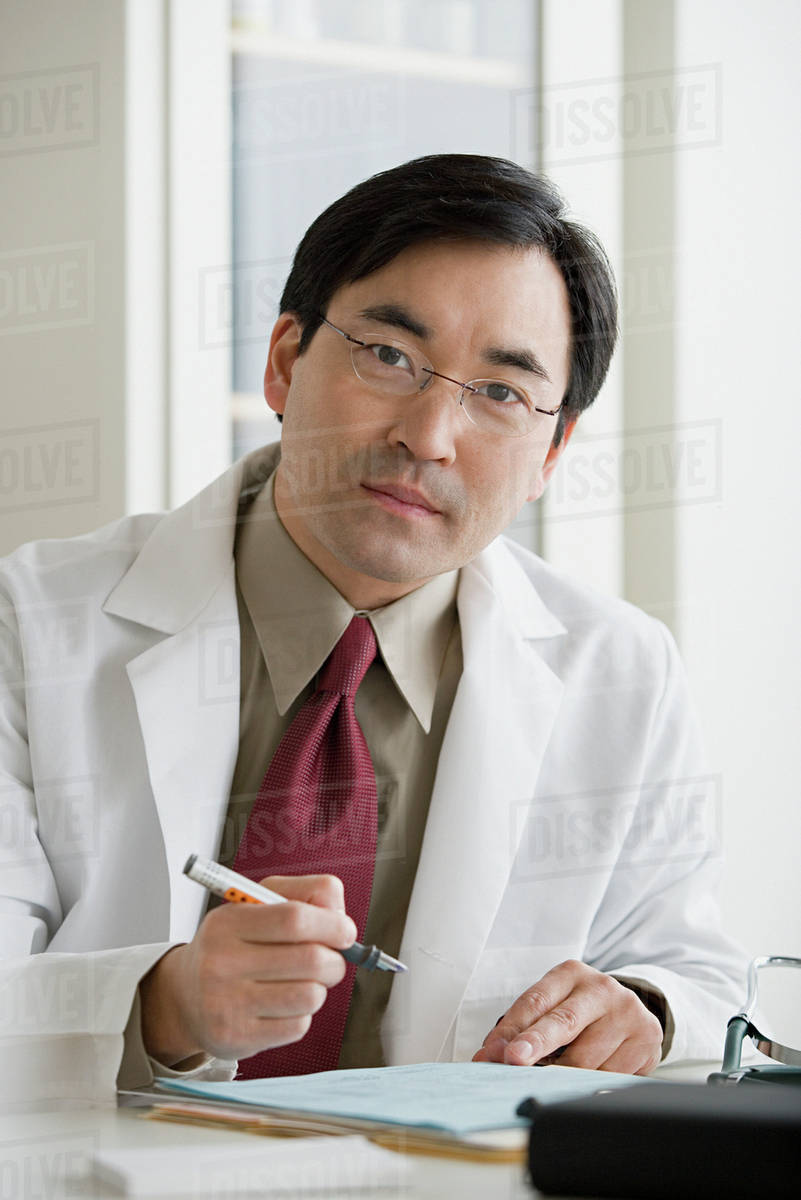 Portrait of male doctor - Stock Photo - Dissolve
