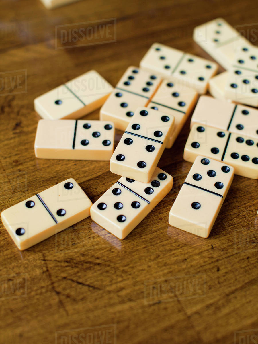 Domino tiles on wooden surface, studio shot - Royalty-free Stock Photo ...
