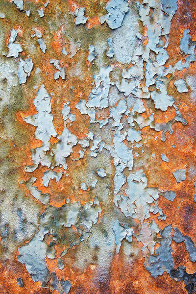 Peeling paint on metal surface - Stock Photo - Dissolve