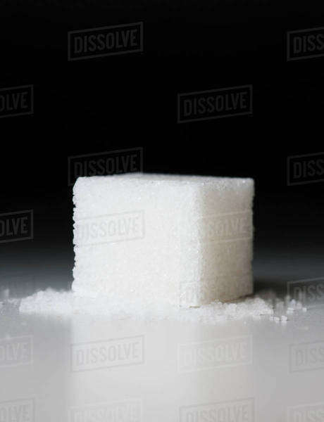 Close up of sugar cube - Stock Photo - Dissolve