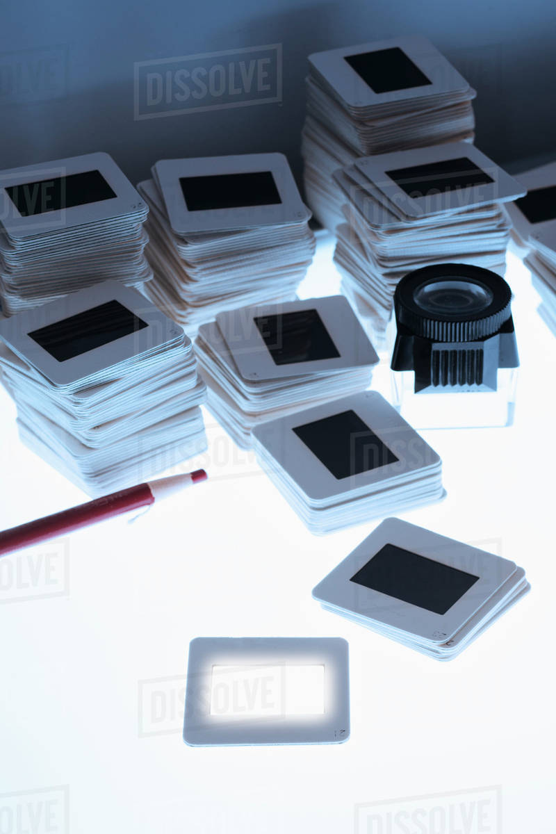Close up of slides and on light box - Royalty-free Stock Photo | Dissolve