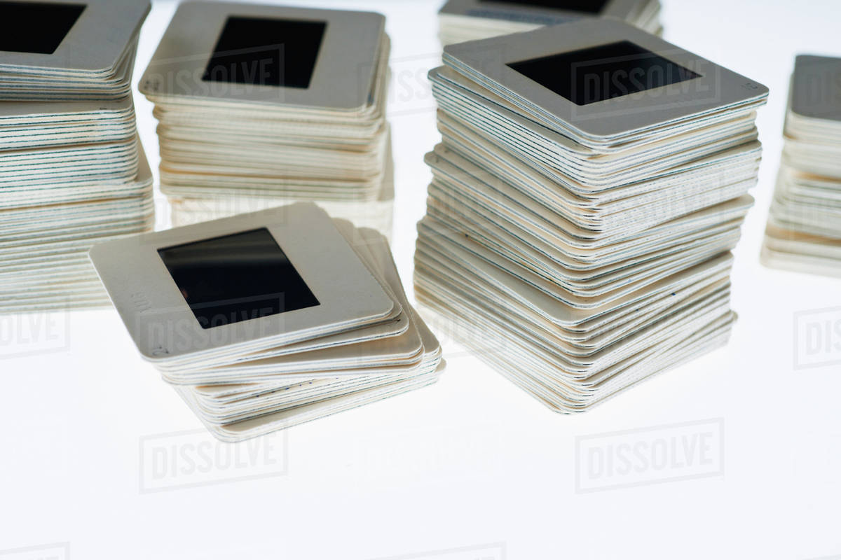 Close up of slides in piles on light box - Royalty-free Stock Photo ...