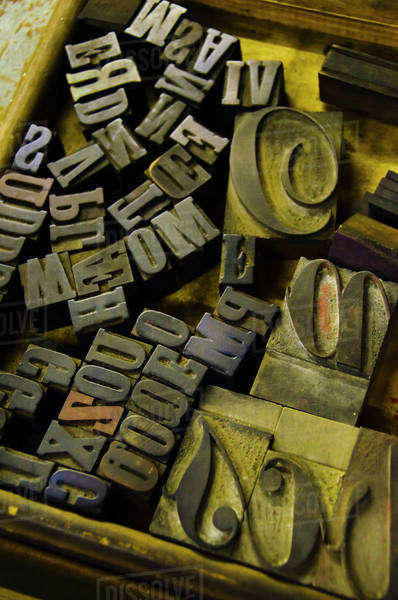 Close up of fonts from antique printing press - Stock Photo - Dissolve