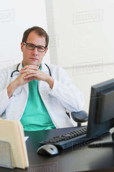 Doctor using computer - Royalty-free Stock Photo | Dissolve