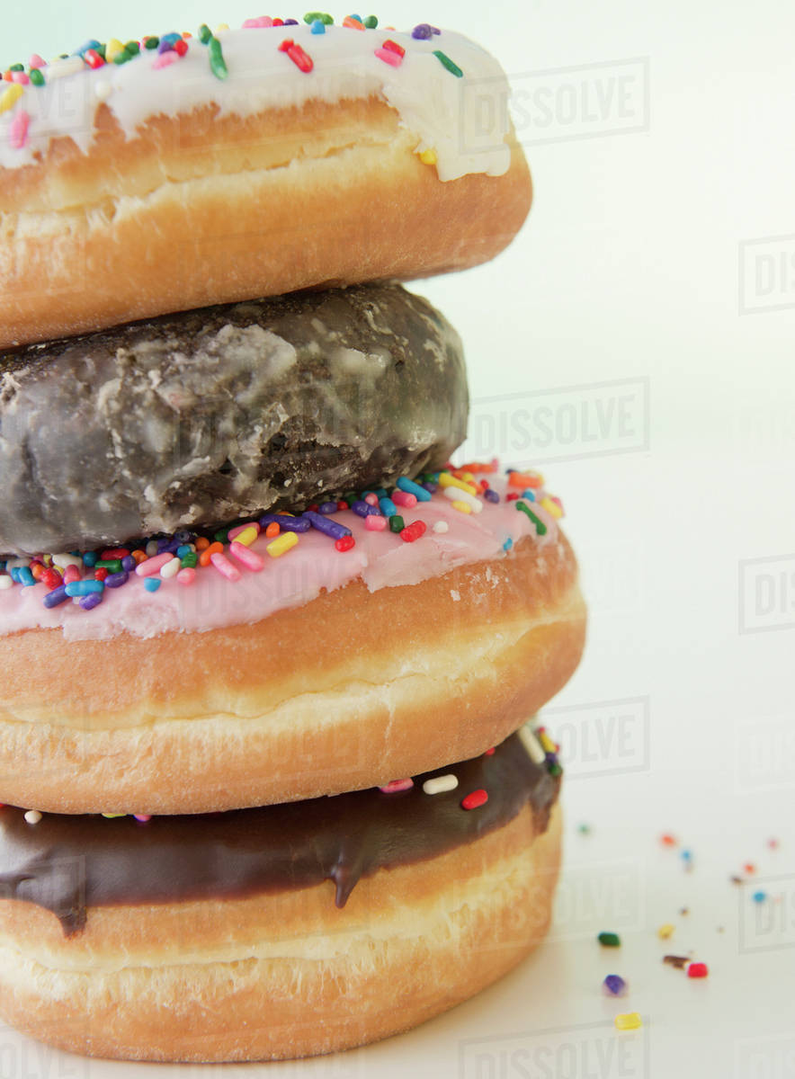 Stack of donuts, close-up - Royalty-free Stock Photo | Dissolve