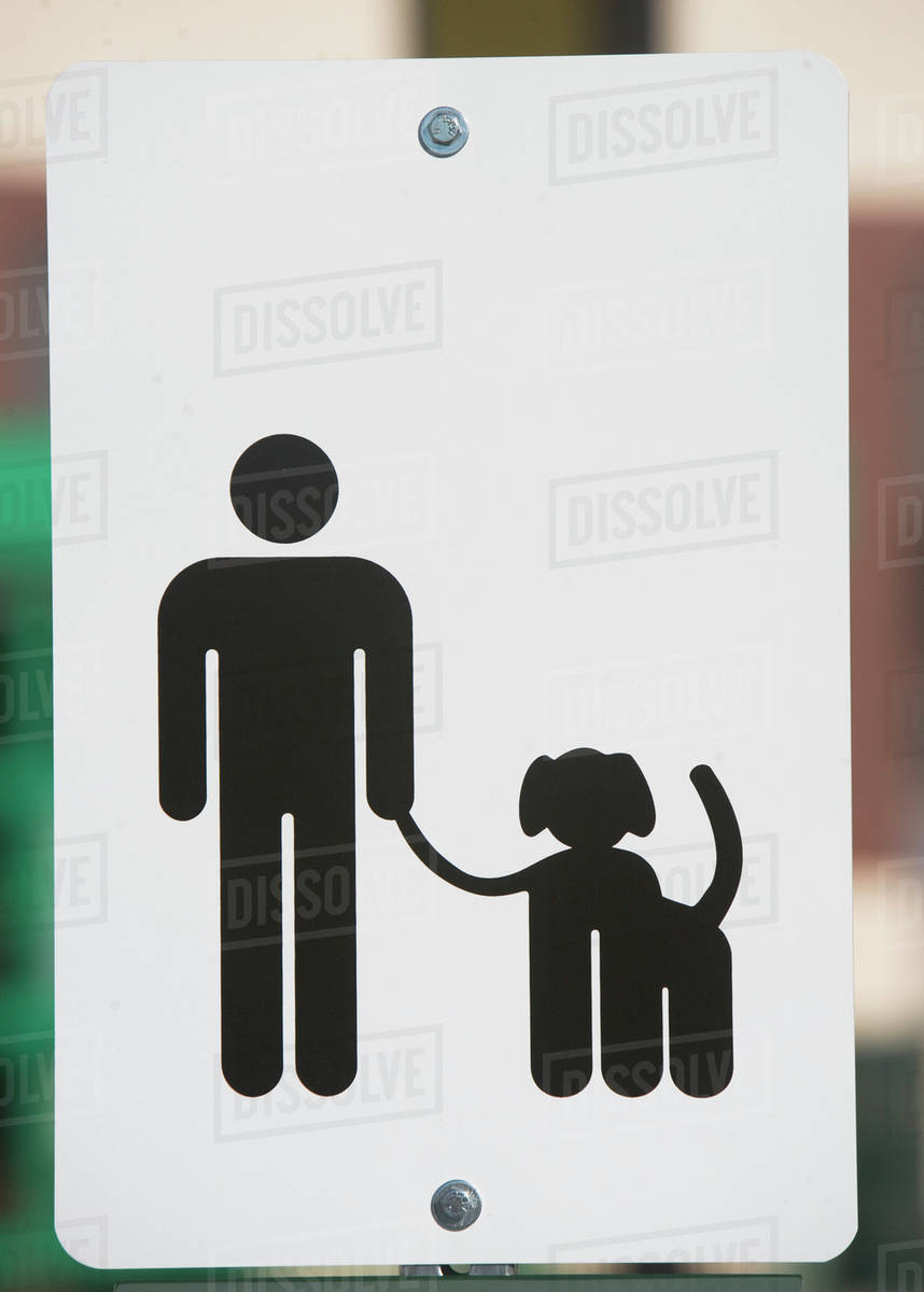 Dog walking sign, Close-up - Royalty-free Stock Photo | Dissolve