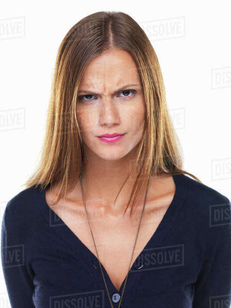 Studio portrait of irritated woman - Royalty-free Stock Photo | Dissolve