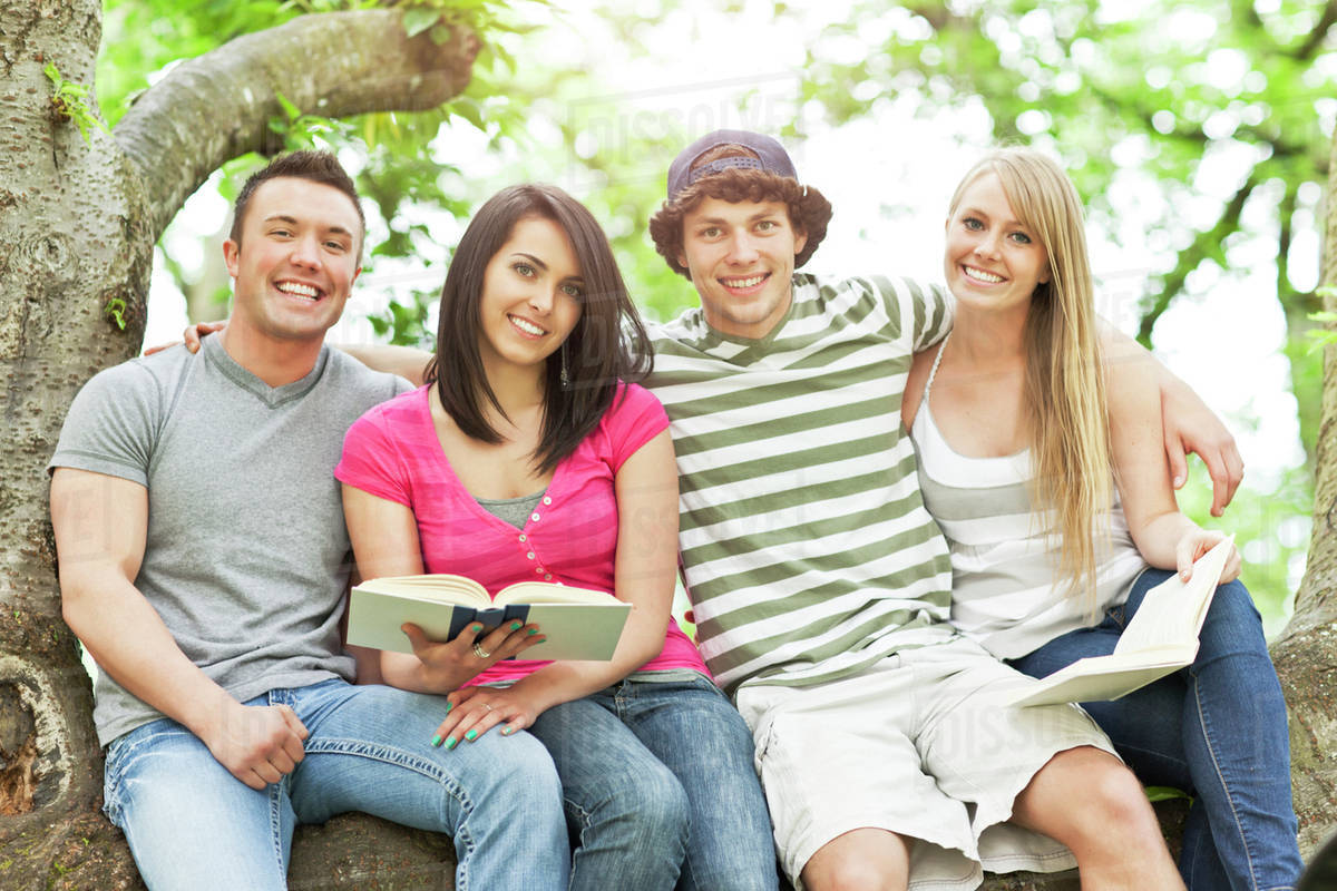 Portrait of college students in park - Royalty-free Stock Photo | Dissolve