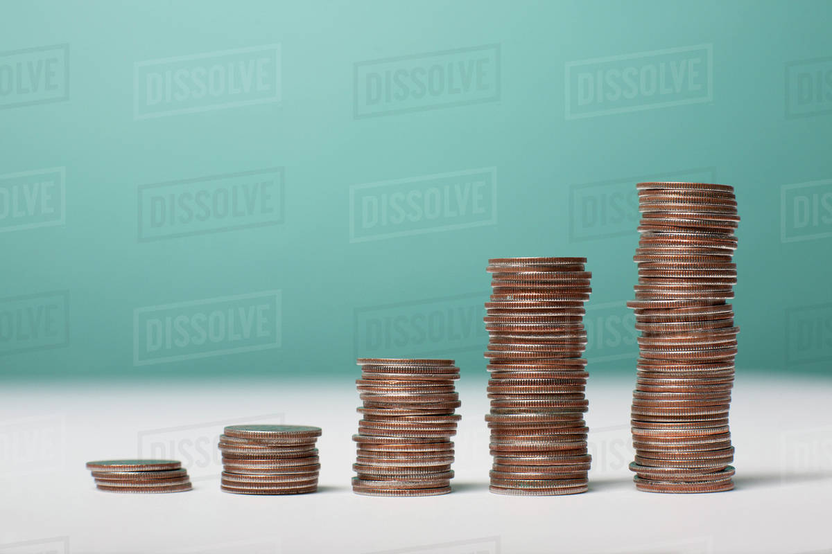Studio shot of stacks of coins - Royalty-free Stock Photo | Dissolve