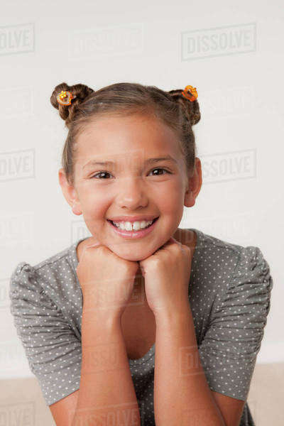 Studio portrait of girl (8-9) - Stock Photo - Dissolve