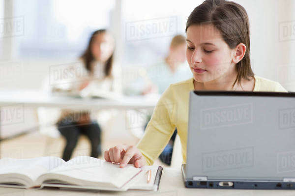 Student working - Stock Photo - Dissolve