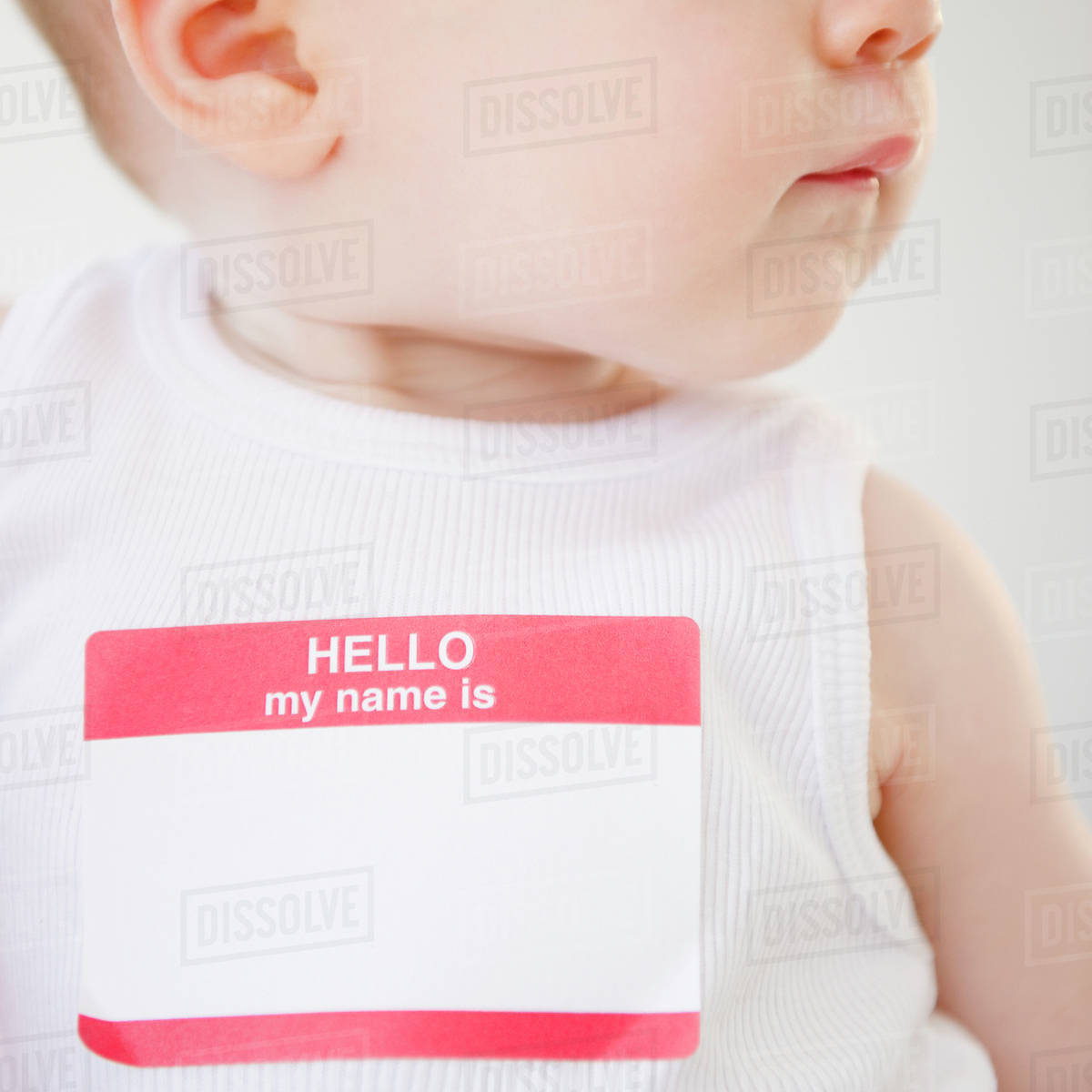 Baby wearing name tag - Royalty-free Stock Photo | Dissolve