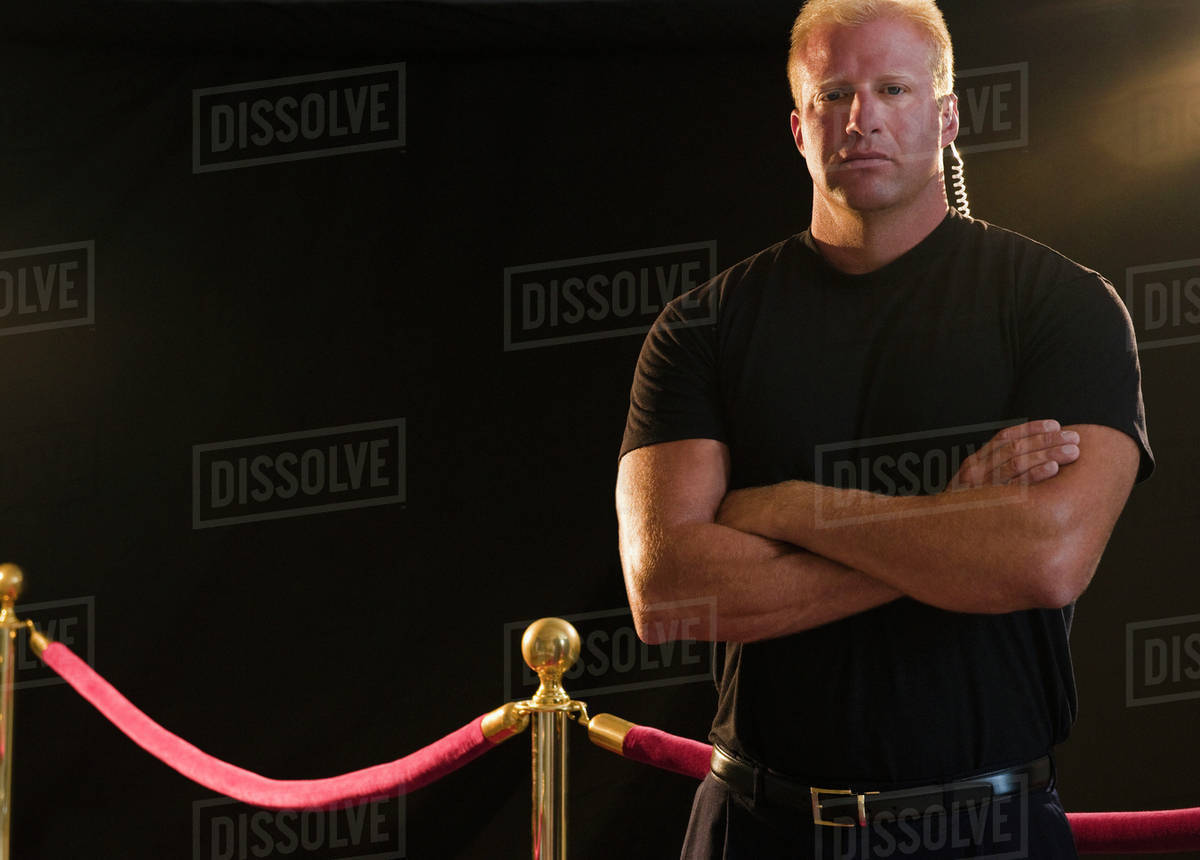 Bouncer at red carpet event - Royalty-free Stock Photo | Dissolve