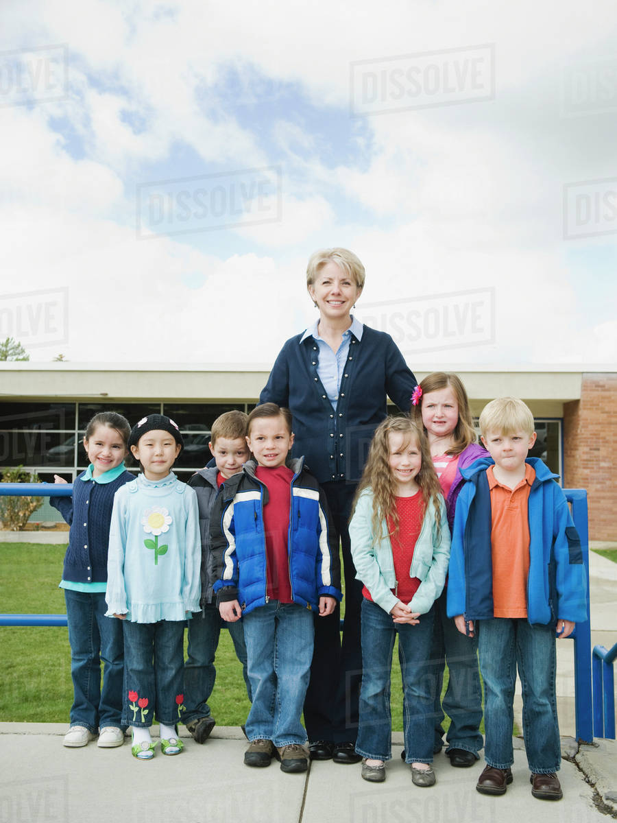 Elementary school students and teacher on a field trip - Stock Photo ...