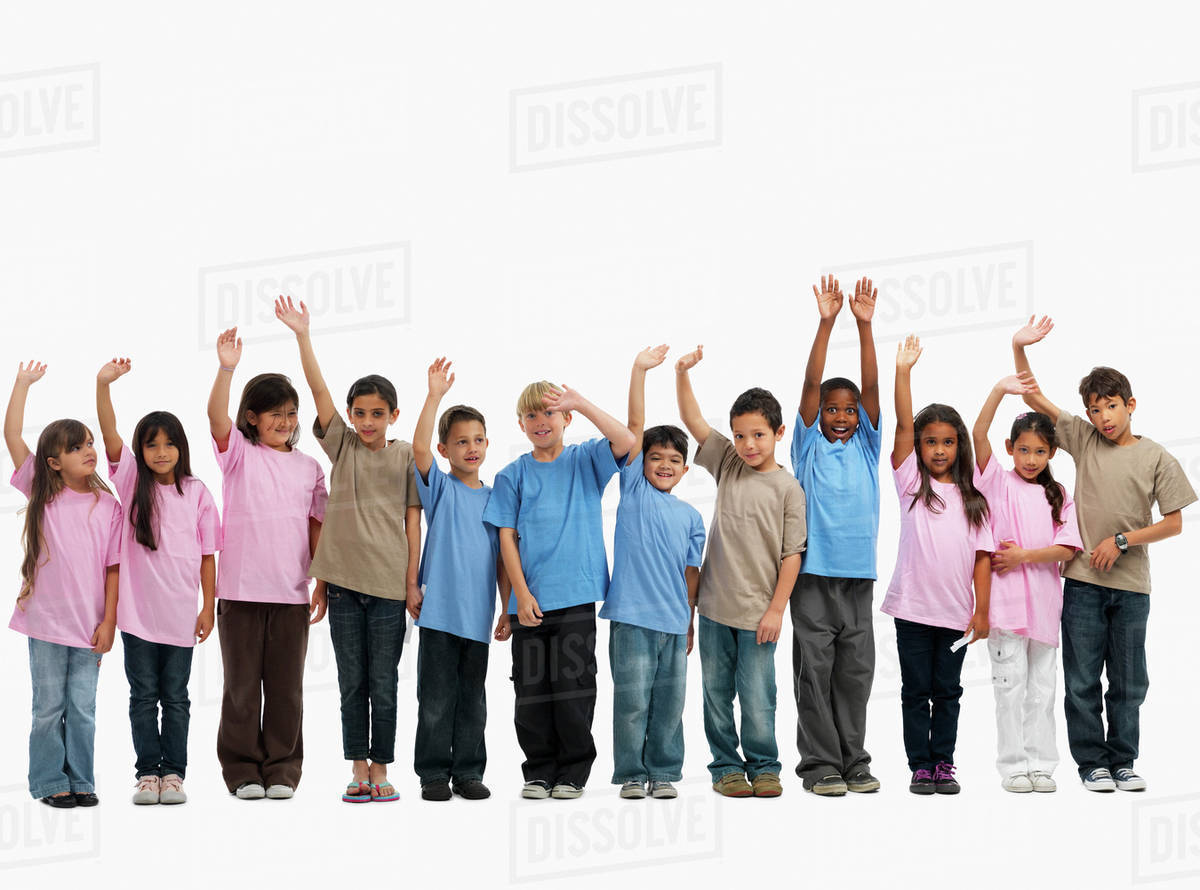 Children raising their hands - Stock Photo - Dissolve