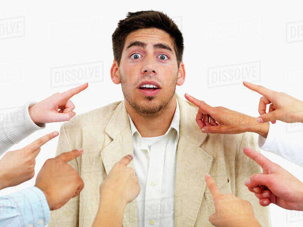 Hands pointing at man - Royalty-free Stock Photo | Dissolve