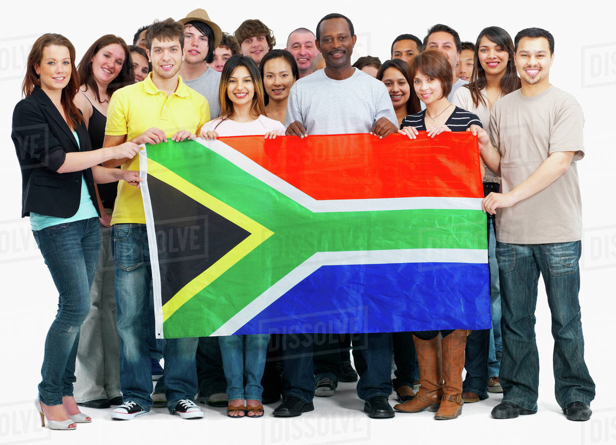 Group of people holding flag - Stock Photo - Dissolve
