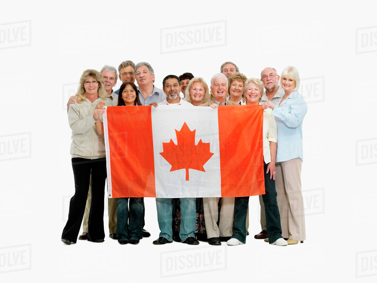 Group of people holding a Canadian flag - Royalty-free Stock Photo ...