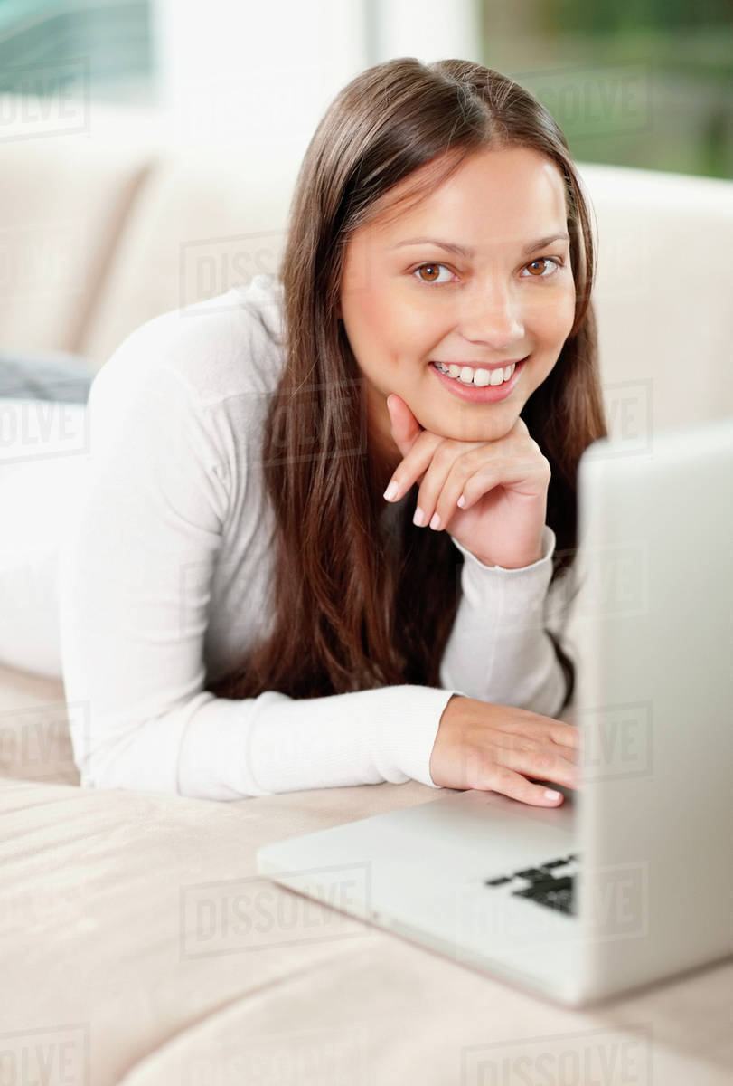 Woman browsing the internet - Royalty-free Stock Photo | Dissolve
