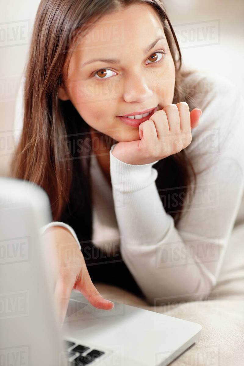 Woman browsing the internet - Royalty-free Stock Photo | Dissolve