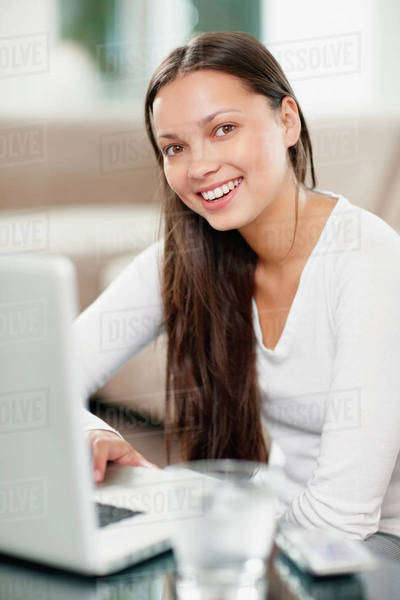 Woman browsing the internet - Royalty-free Stock Photo | Dissolve