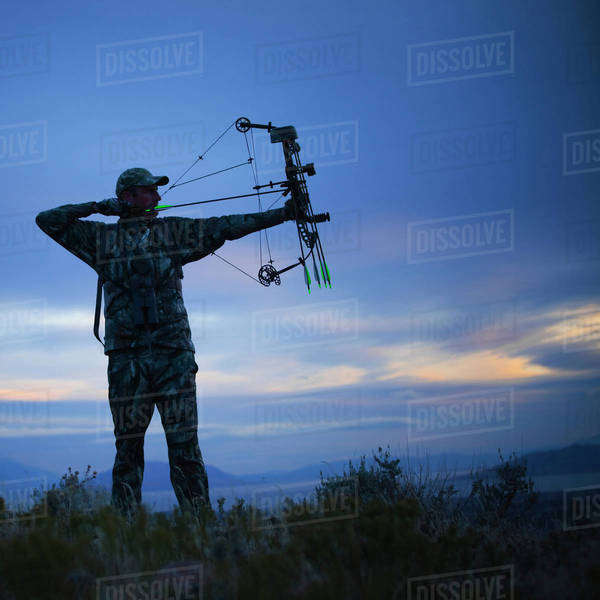 Bow and arrow hunter - Royalty-free Stock Photo | Dissolve