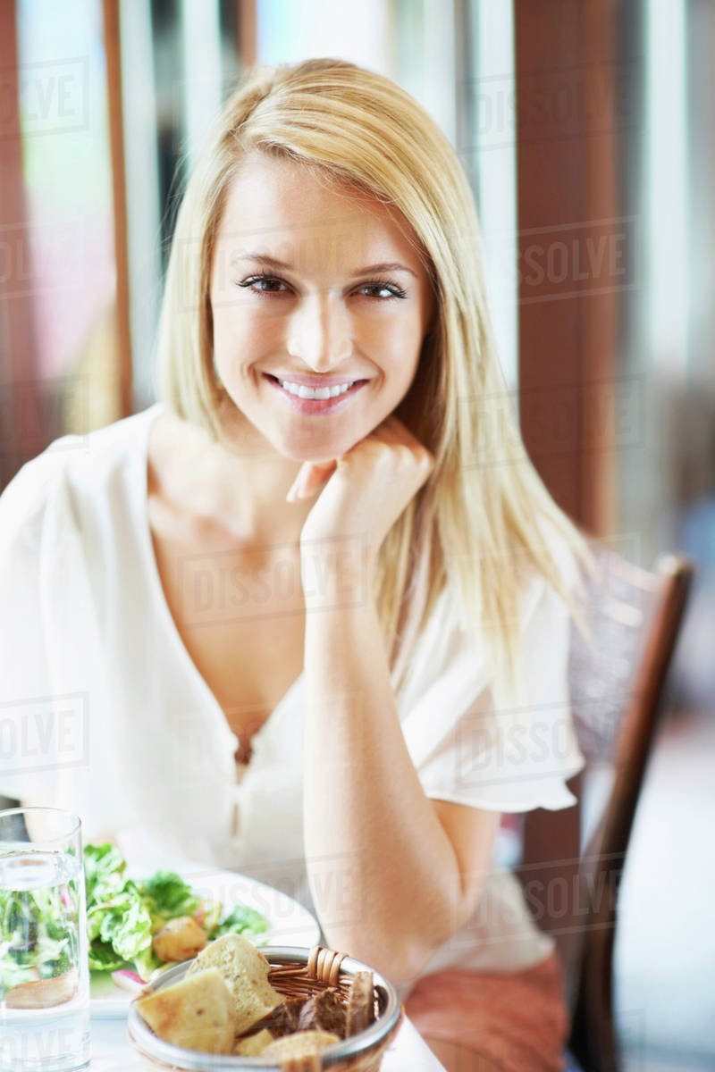 Woman eating lunch - Royalty-free Stock Photo | Dissolve