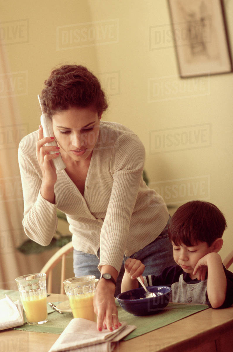 Multi tasking mother - Royalty-free Stock Photo | Dissolve