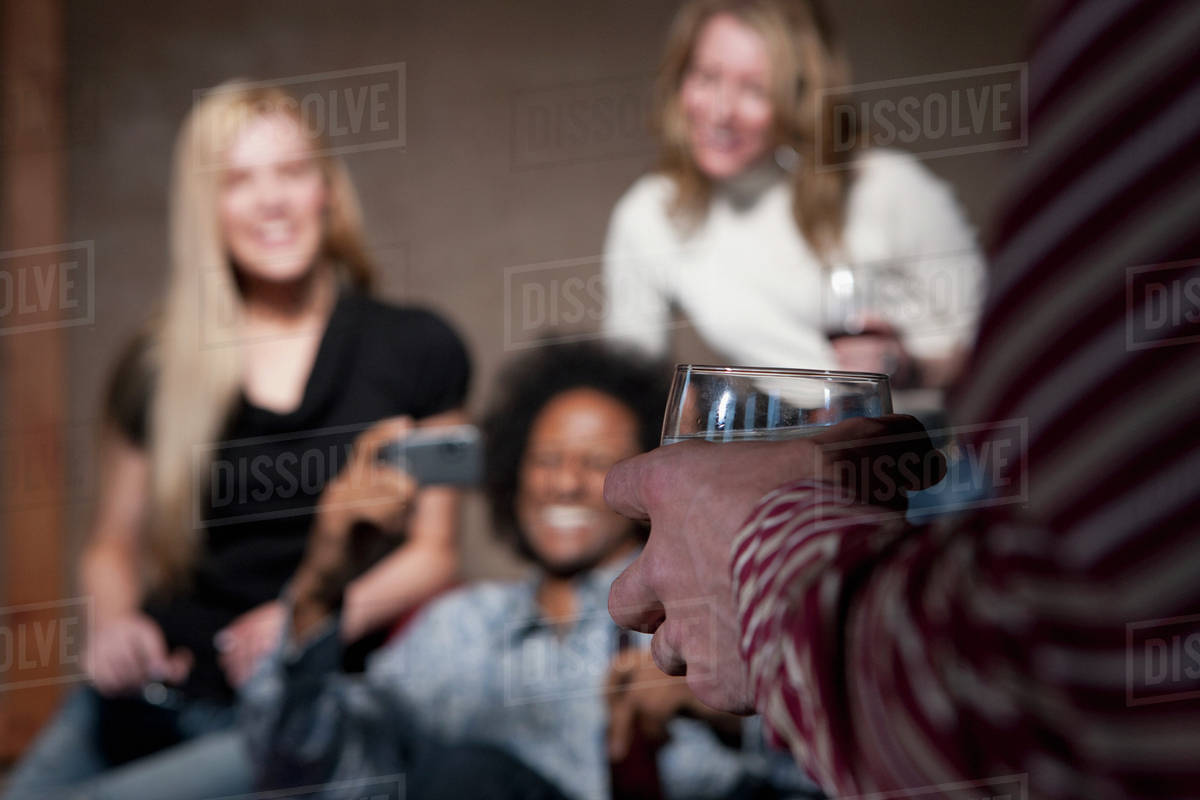 Group of people socializing at a party - Royalty-free Stock Photo ...