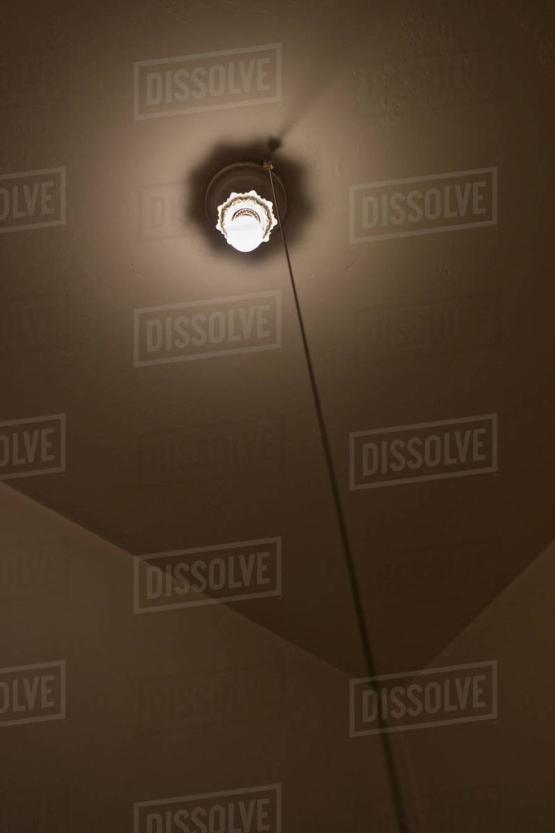 A lightbulb in a room - Royalty-free Stock Photo | Dissolve
