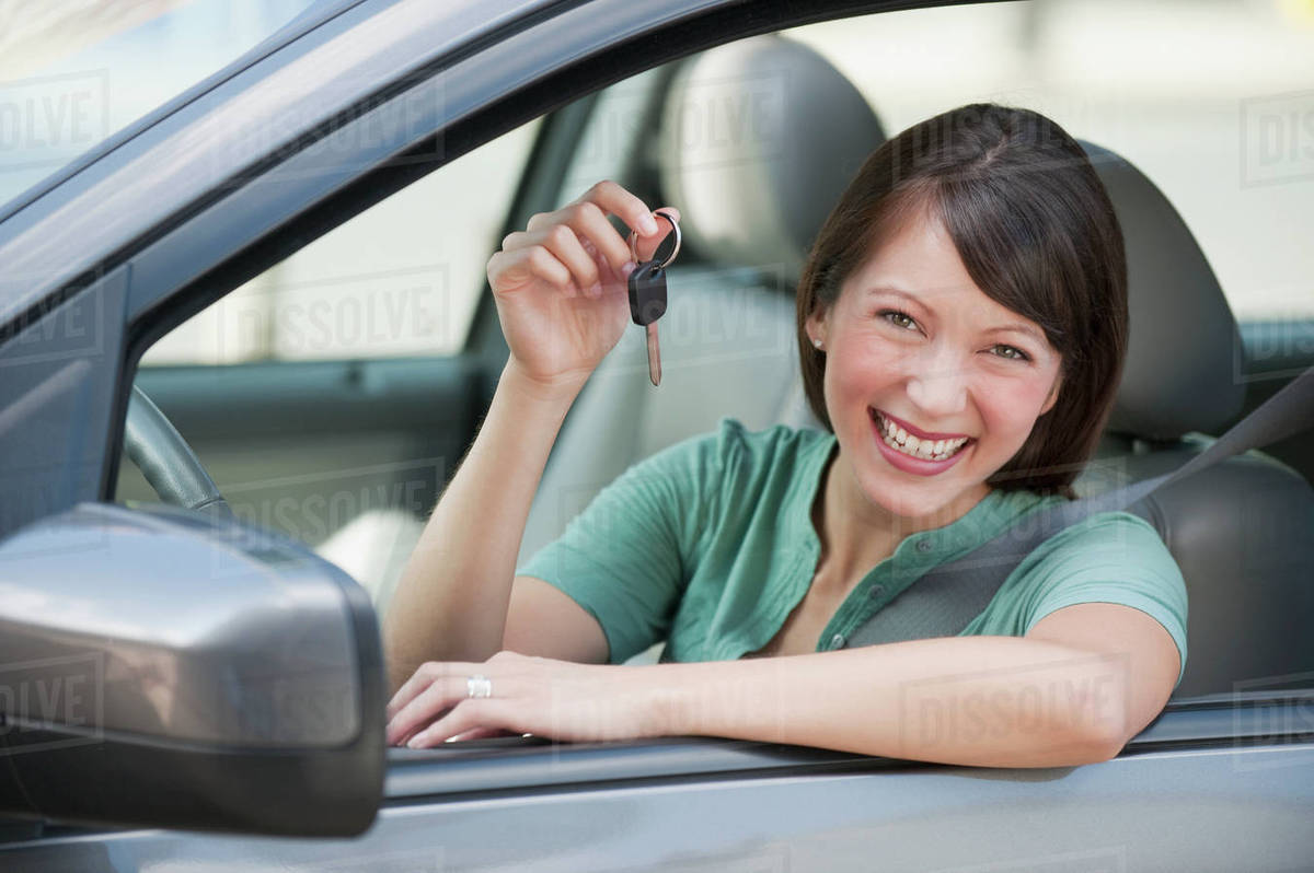 Woman car shopping - Royalty-free Stock Photo | Dissolve