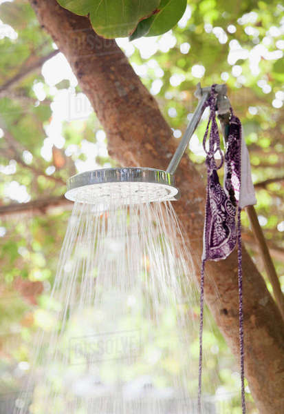 Outdoor shower under trees - Royalty-free Stock Photo | Dissolve