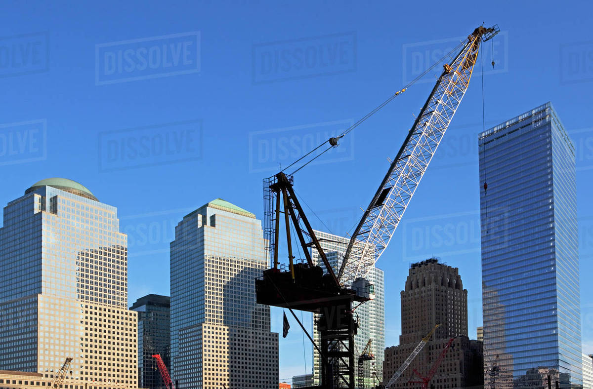 Crane and Skyscrapers - Royalty-free Stock Photo | Dissolve