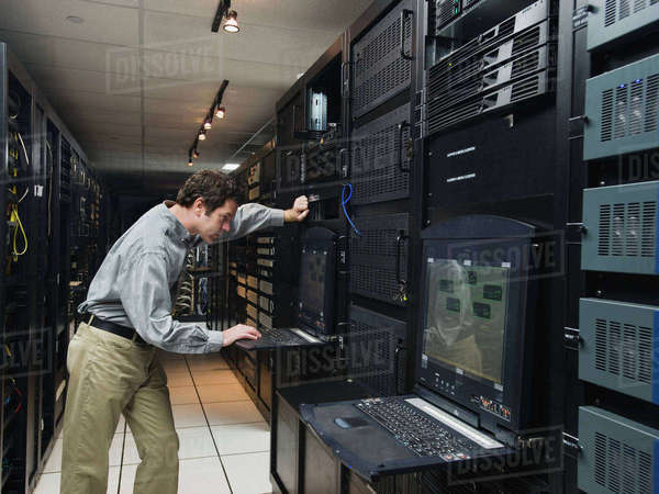 Man working in data center - Royalty-free Stock Photo | Dissolve