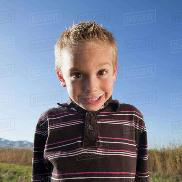 Young boy with goofy expression - Royalty-free Stock Photo | Dissolve