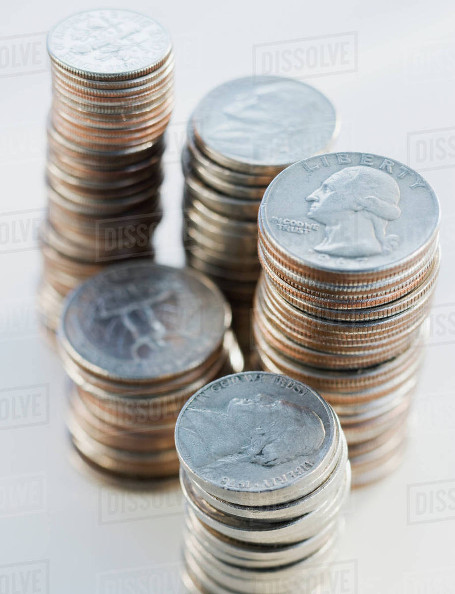 Close up of stacks of coins - Royalty-free Stock Photo | Dissolve