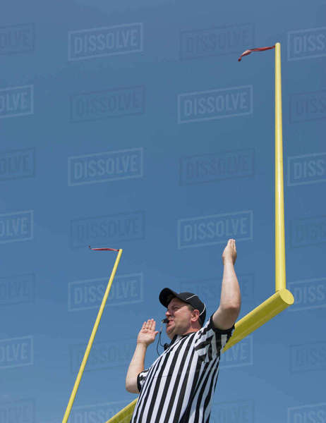Football referee calling field goal - Royalty-free Stock Photo | Dissolve
