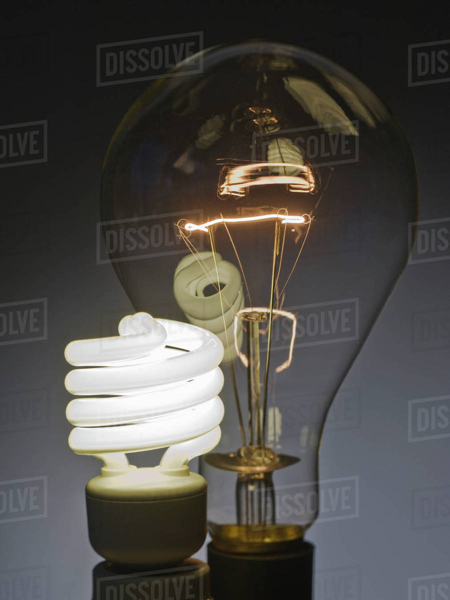 Large light bulb and compact fluorescent bulb - Royalty-free Stock ...