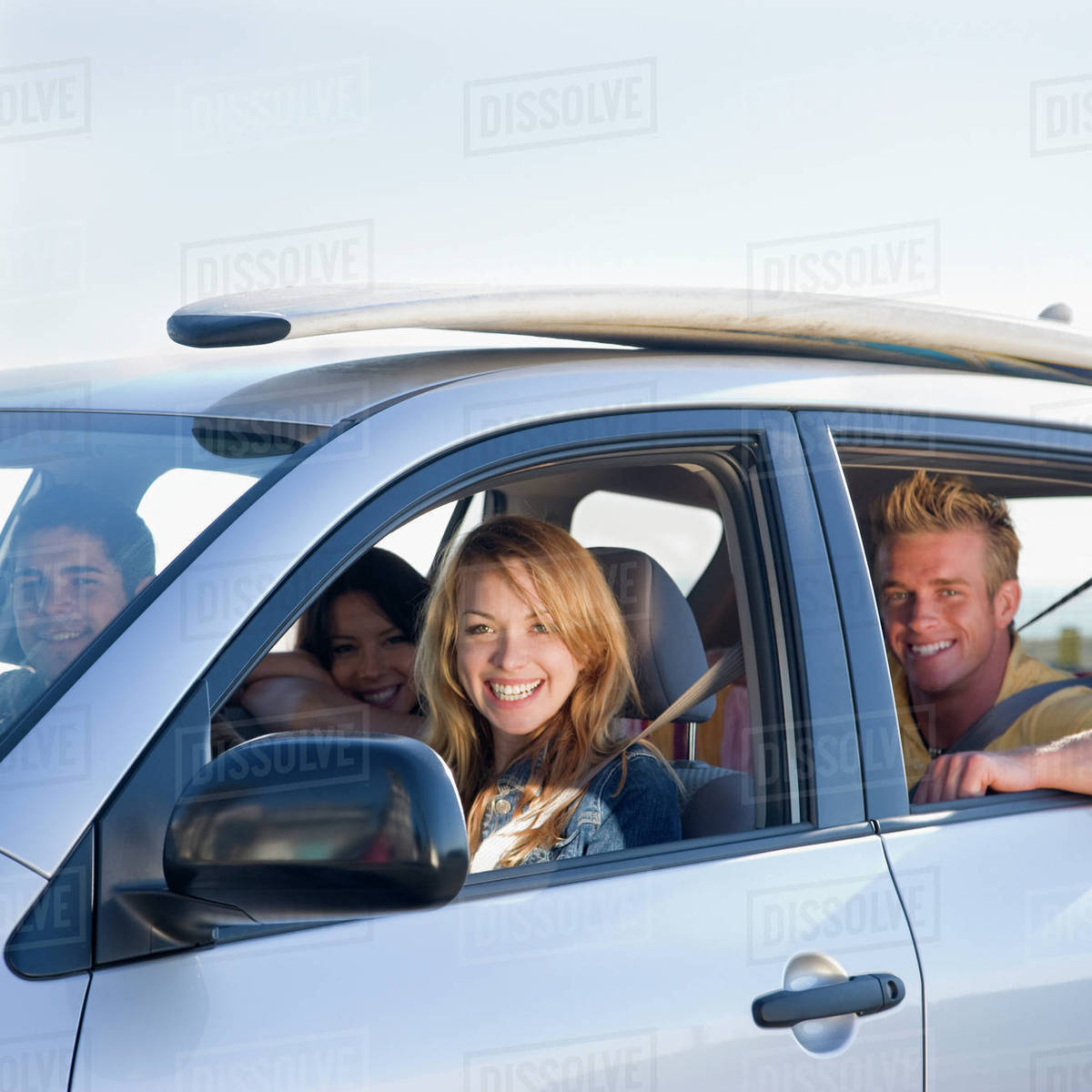Friends driving in car - Stock Photo - Dissolve