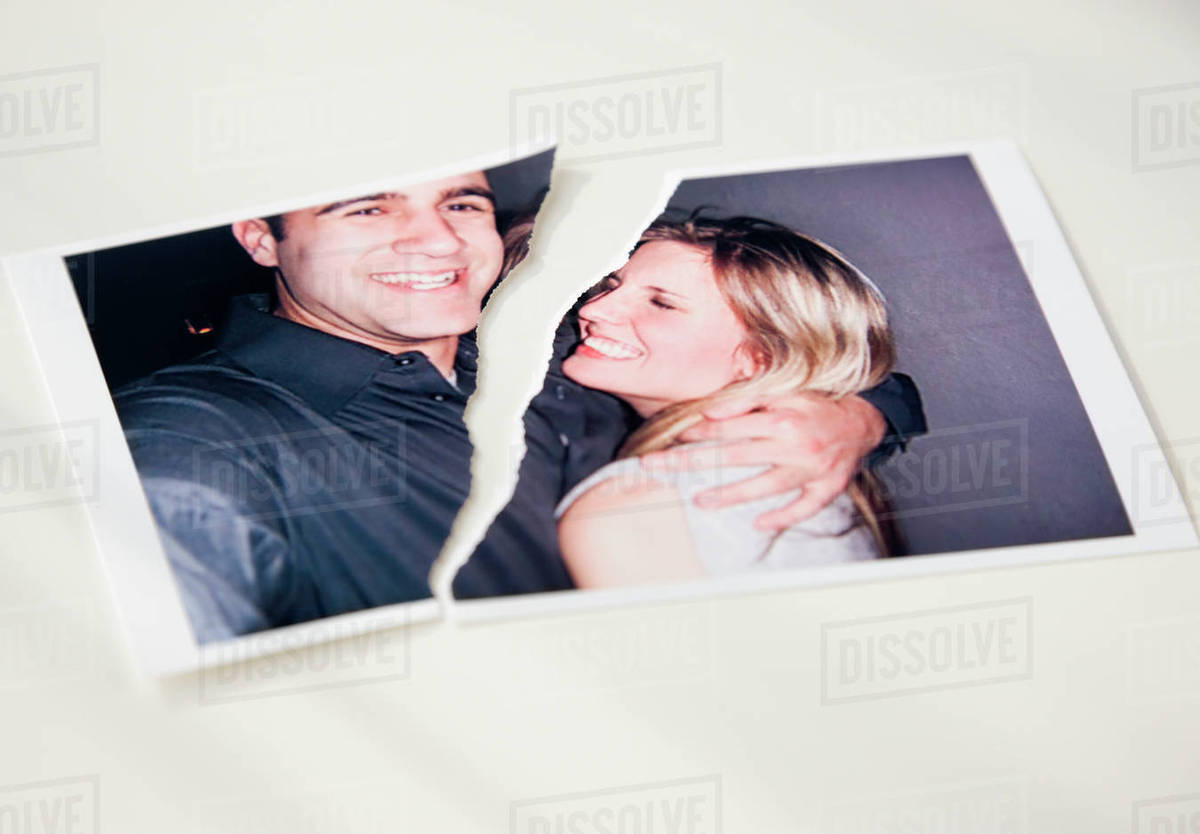 Photograph of couple ripped in half - Royalty-free Stock Photo | Dissolve