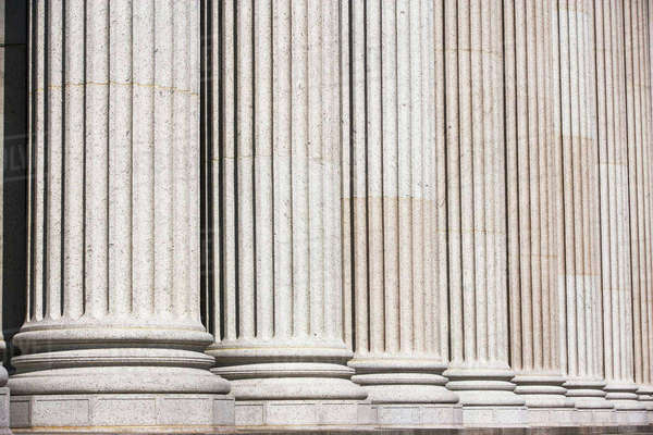 Row of stone columns - Stock Photo - Dissolve
