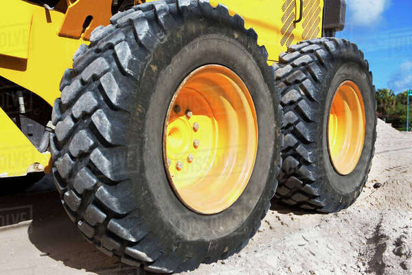Tires on heavy construction equipment - Royalty-free Stock Photo | Dissolve
