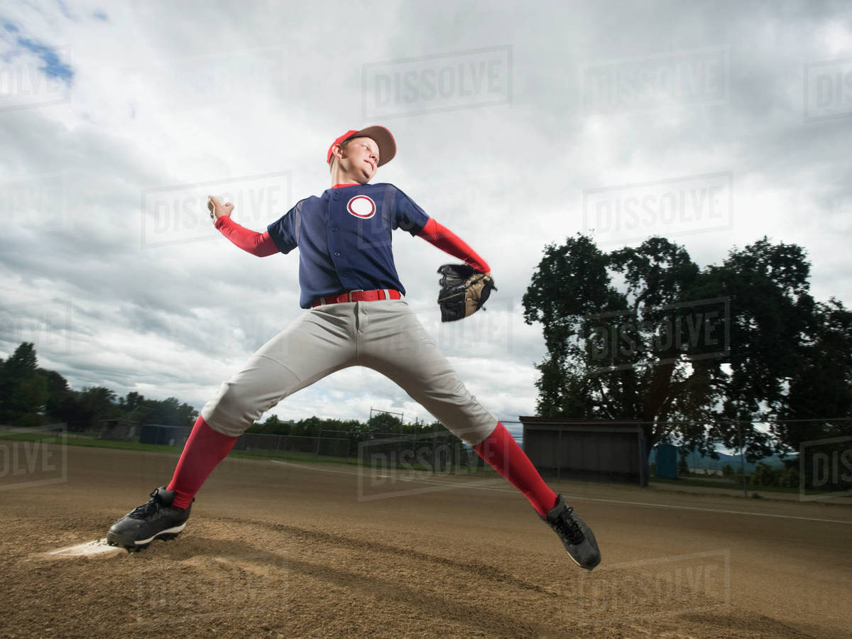 Baseball pitcher throwing ball - Royalty-free Stock Photo | Dissolve