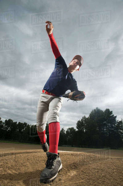 Baseball pitcher throwing ball - Royalty-free Stock Photo | Dissolve