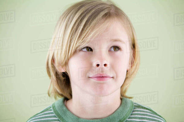 Boy looking sideways - Stock Photo - Dissolve
